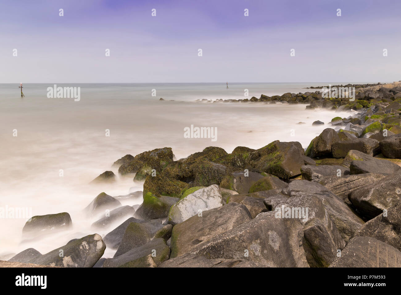 Long exposure image of the sea defences on a summers day at Sheringham ...