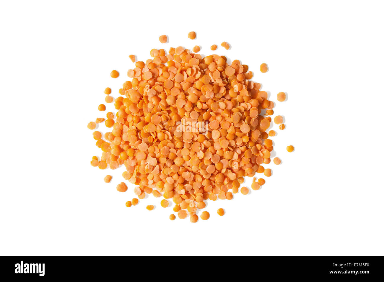 Stack of red lentils isolated on a white background from above Stock ...