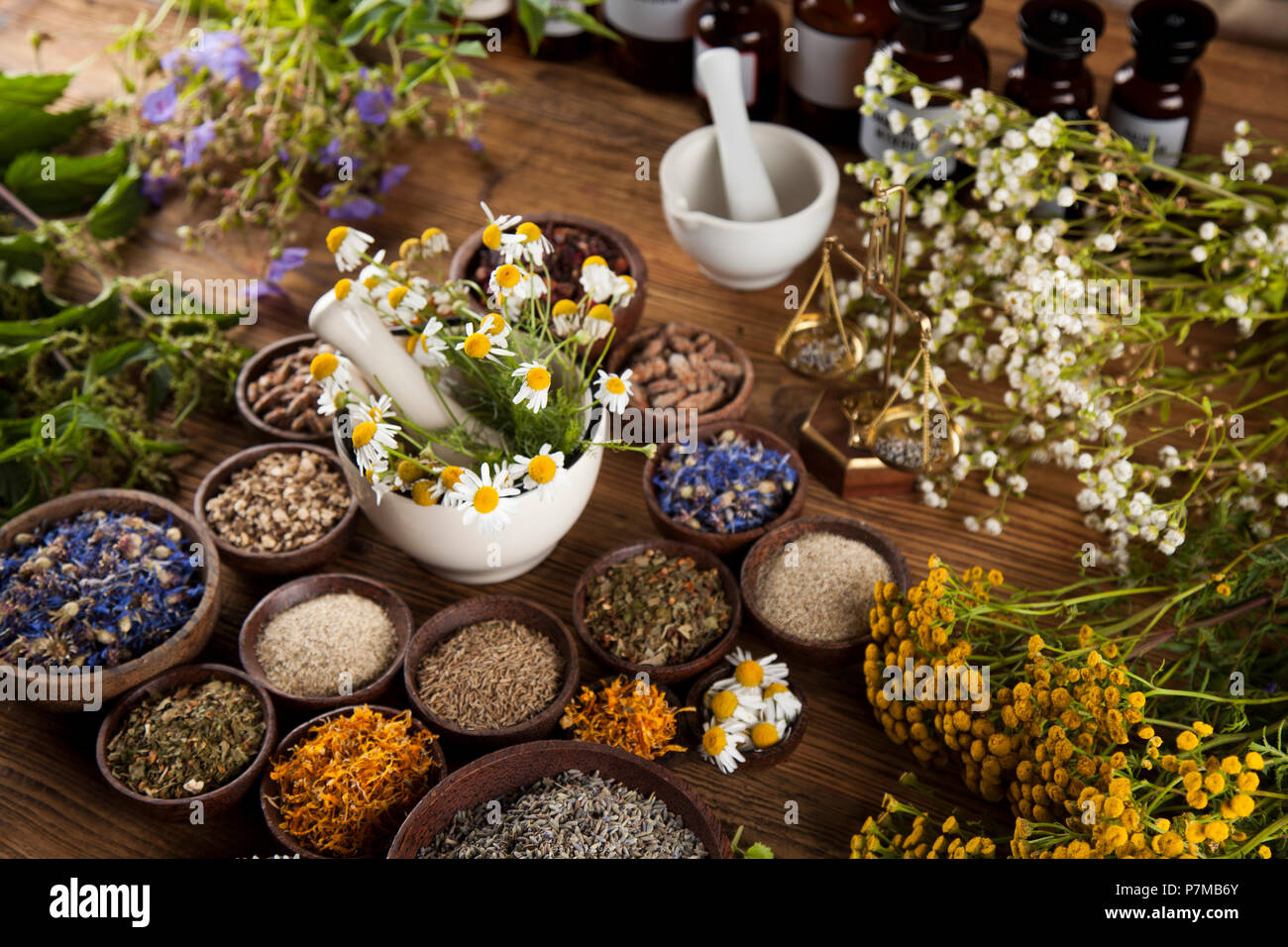 Fresh medicinal, healing herbs on wooden Stock Photo - Alamy