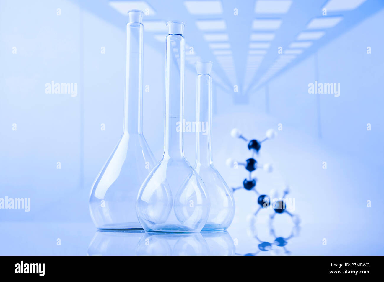 Chemistry science, Laboratory glassware background Stock Photo - Alamy