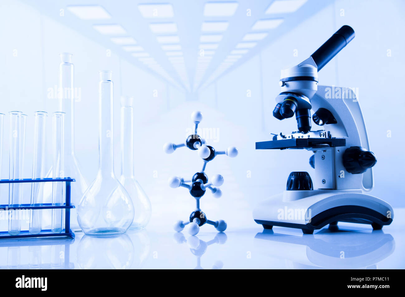 Chemistry science, Laboratory glassware background Stock Photo - Alamy