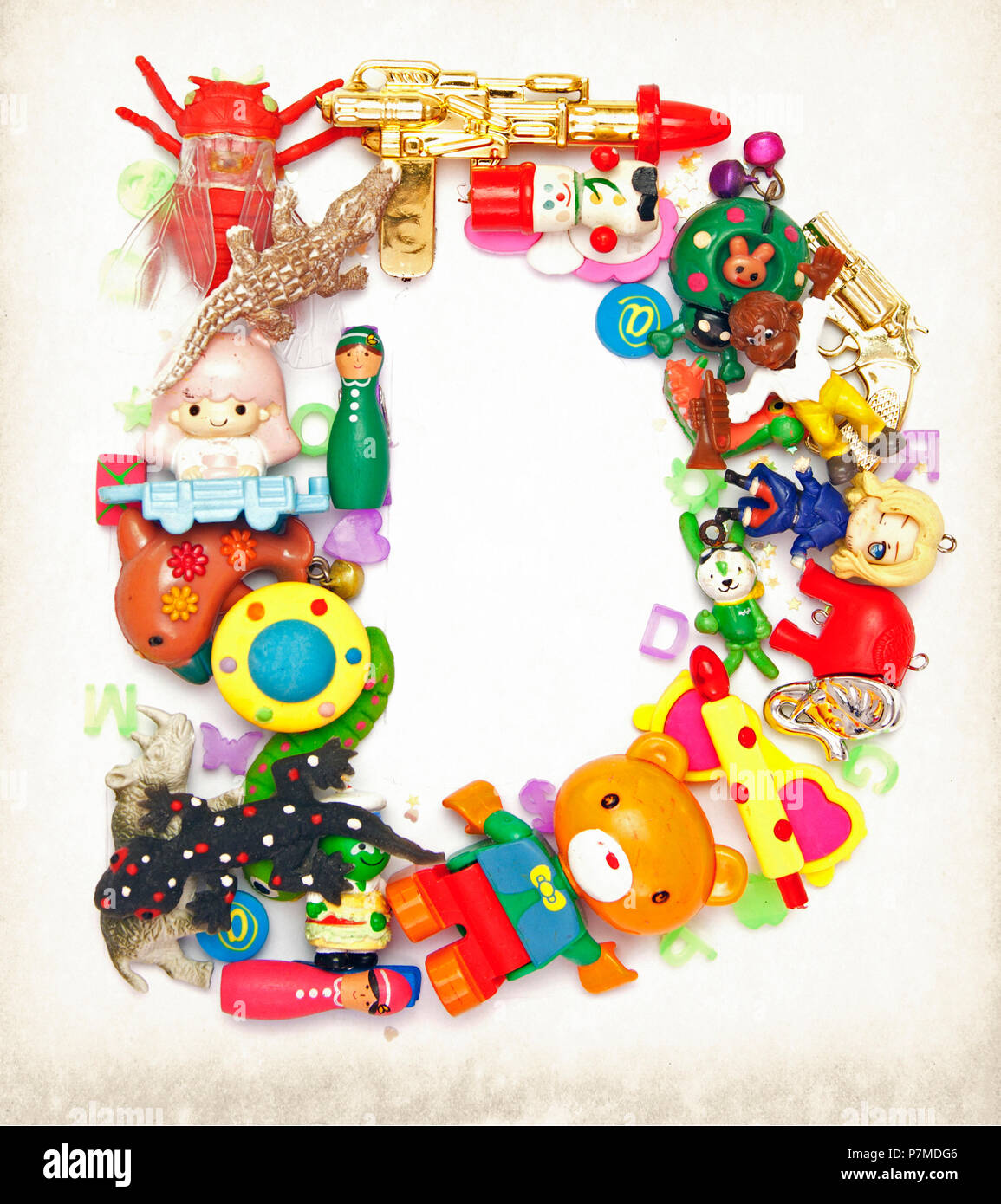 the letter D made from small toys Stock Photo - Alamy
