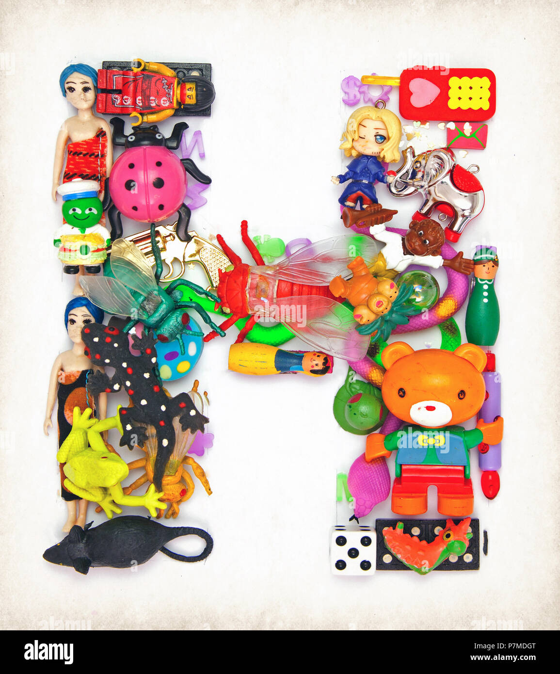 the letter H made from small toys Stock Photo - Alamy