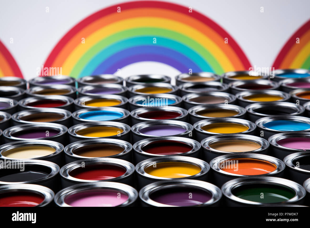 Rainbow colors, Open cans of paint Stock Photo - Alamy