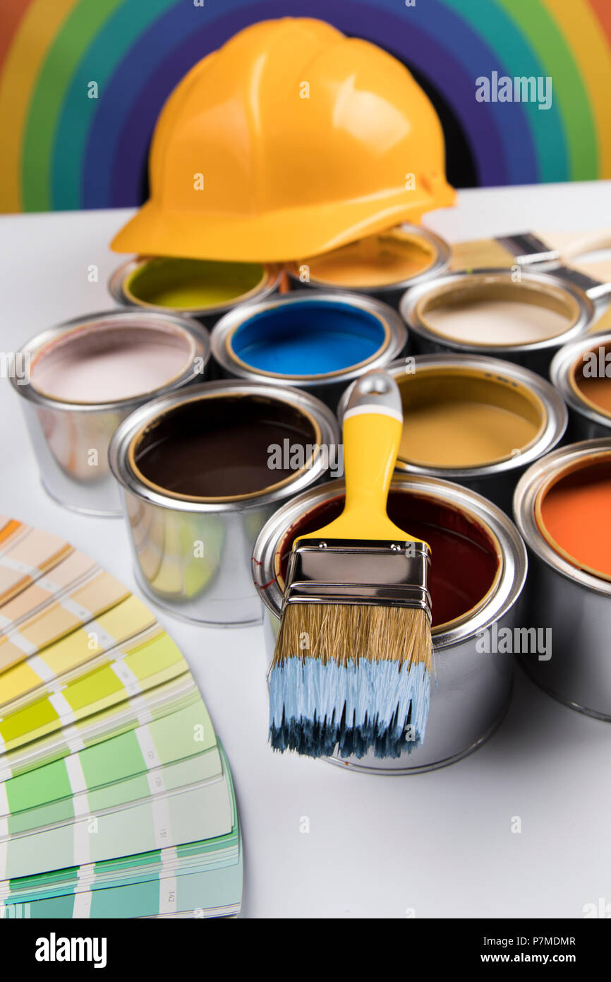 Rainbow colors, Open cans of paint Stock Photo - Alamy