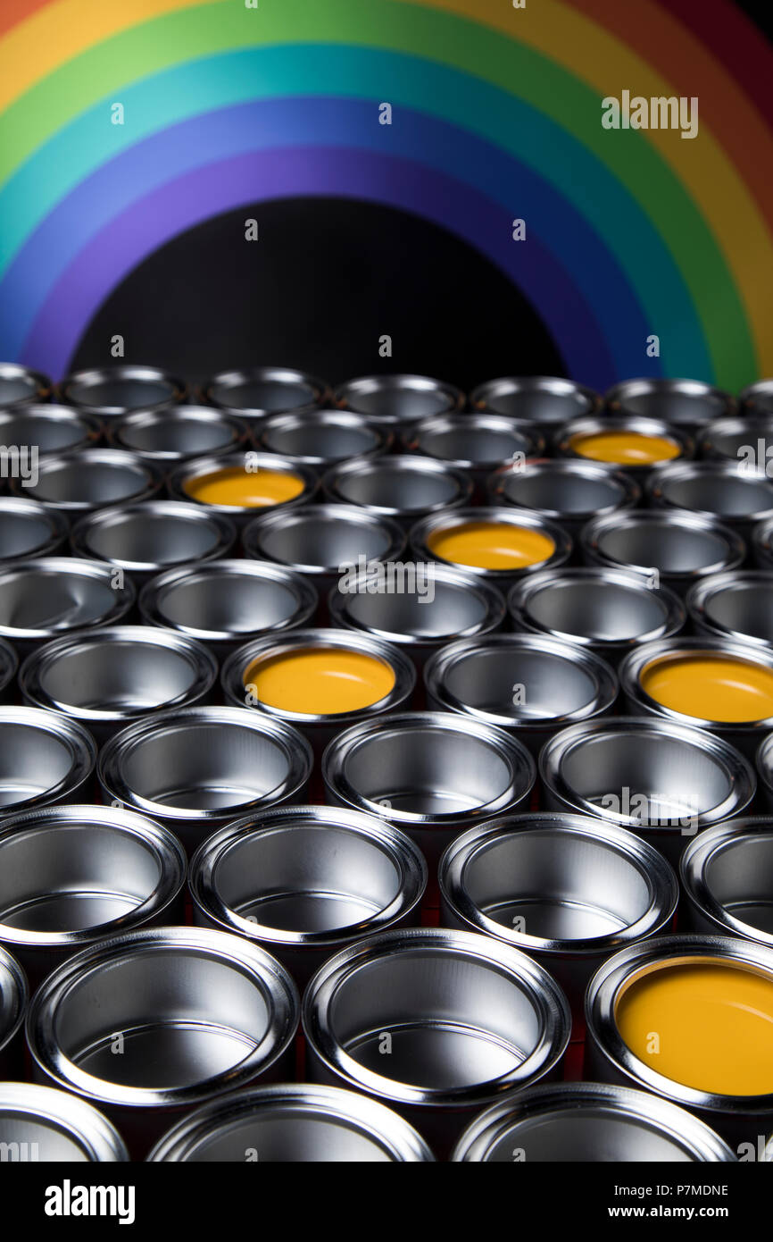 Rainbow, tin metal cans with color paint Stock Photo - Alamy