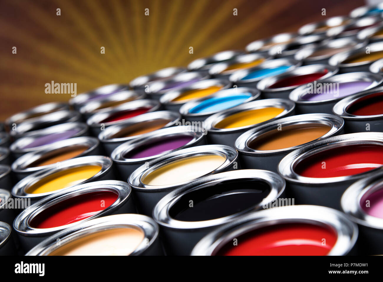 Group of tin metal cans with color paint Stock Photo - Alamy
