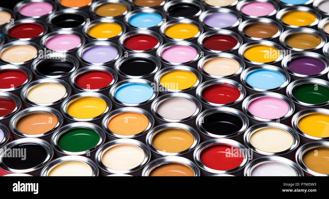 Full Buckets of rainbow colored oil paint Stock Photo - Alamy