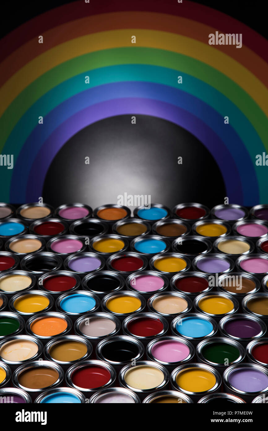 Full Buckets of rainbow colored oil paint Stock Photo - Alamy