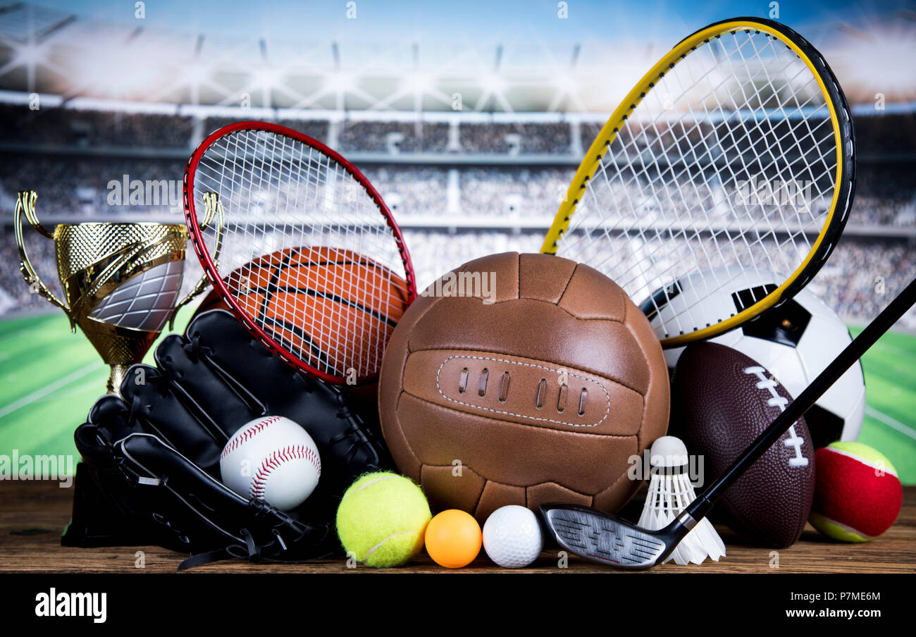 Cups of winners award, Sport equipment and balls Stock Photo - Alamy
