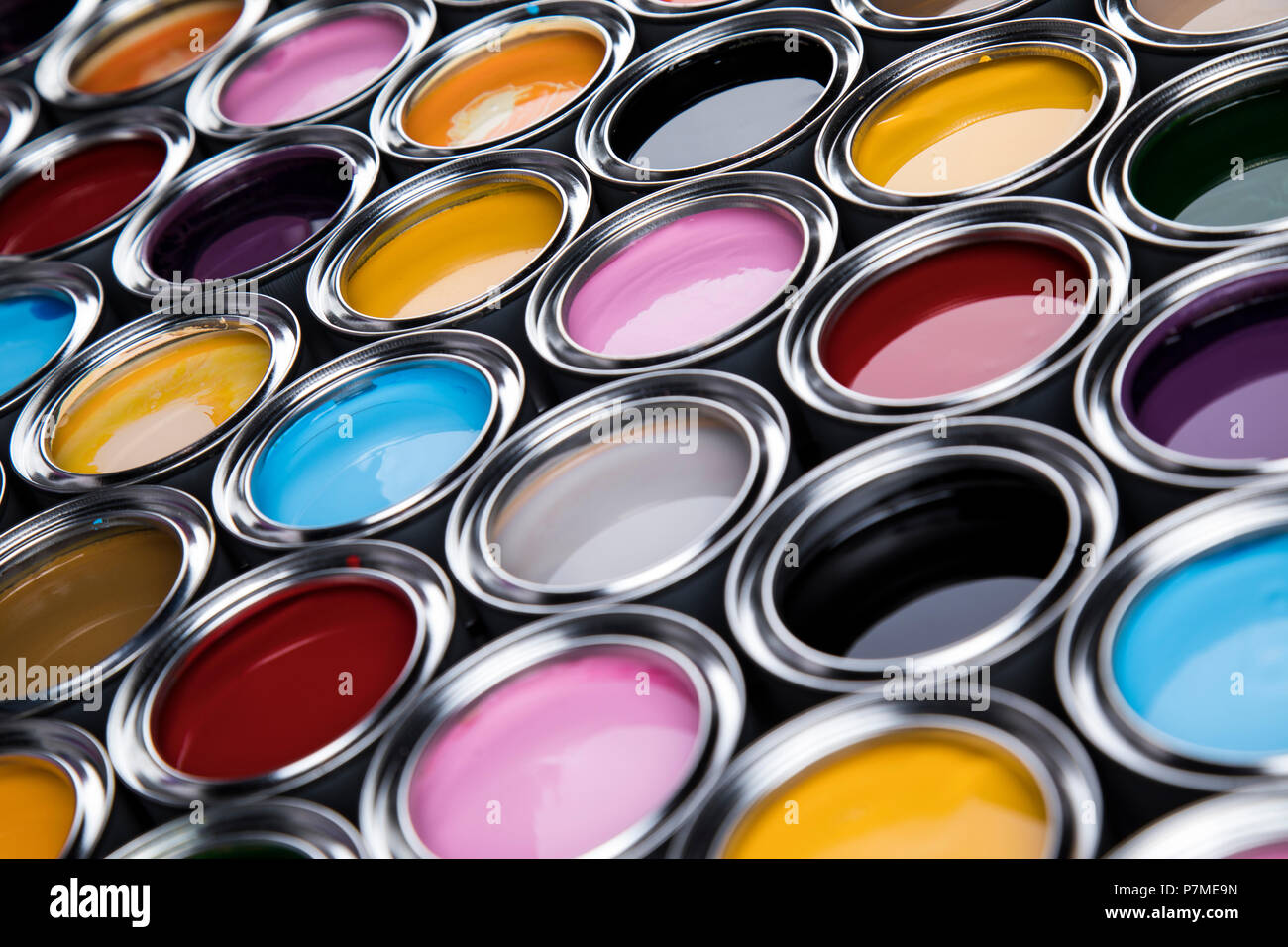 Full Buckets of rainbow colored oil paint Stock Photo - Alamy