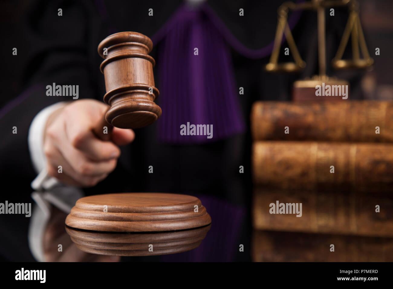 Judge, male judge in a courtroom striking the gavel Stock Photo - Alamy