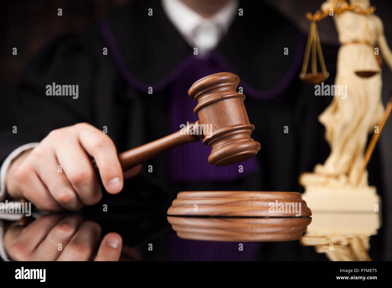 Judge, male judge in a courtroom striking the gavel Stock Photo - Alamy