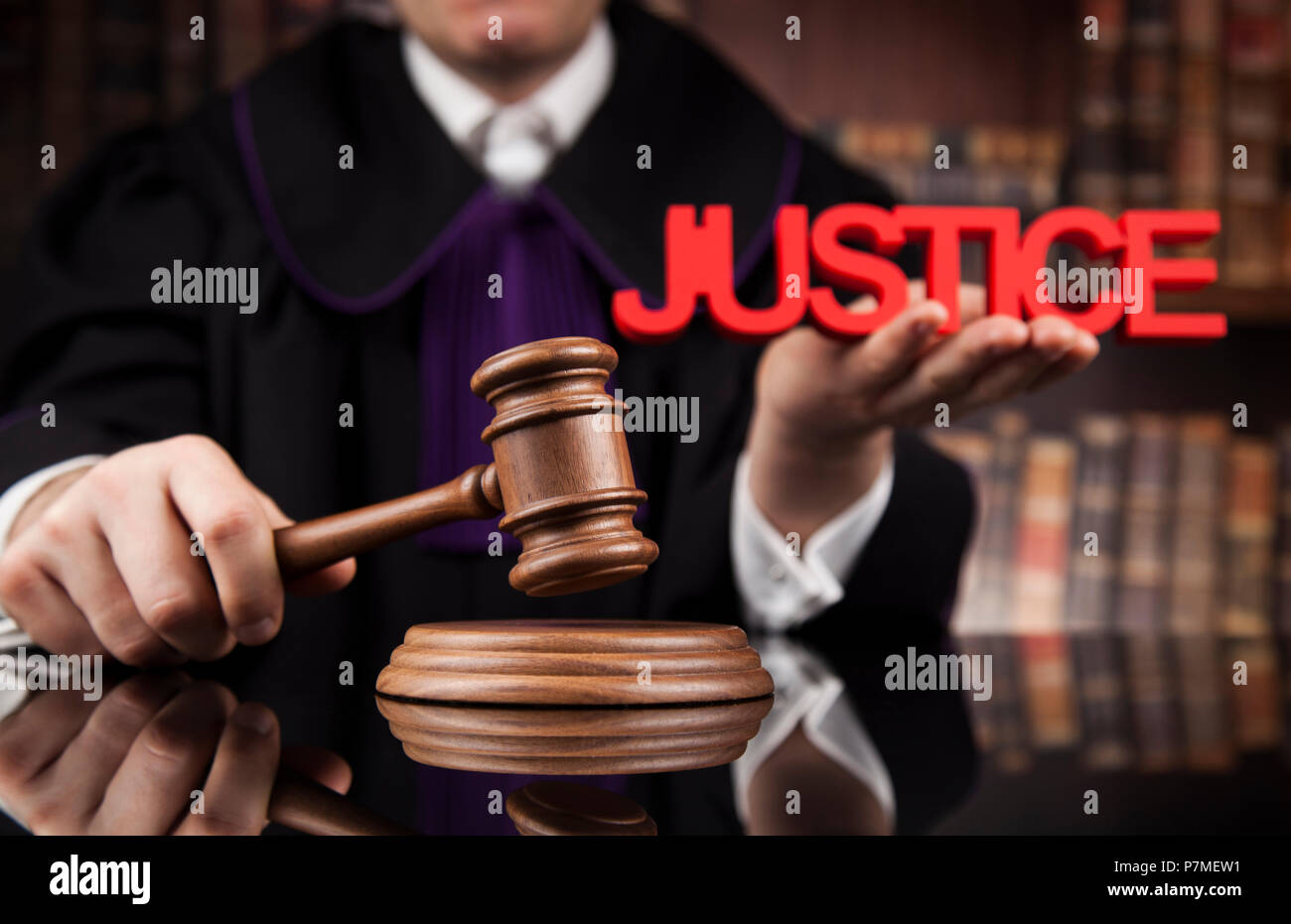 Judge, male judge in a courtroom striking the gavel Stock Photo - Alamy
