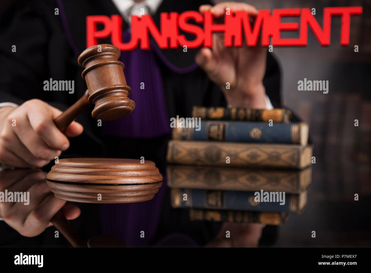 Judge, male judge in a courtroom striking the gavel Stock Photo - Alamy