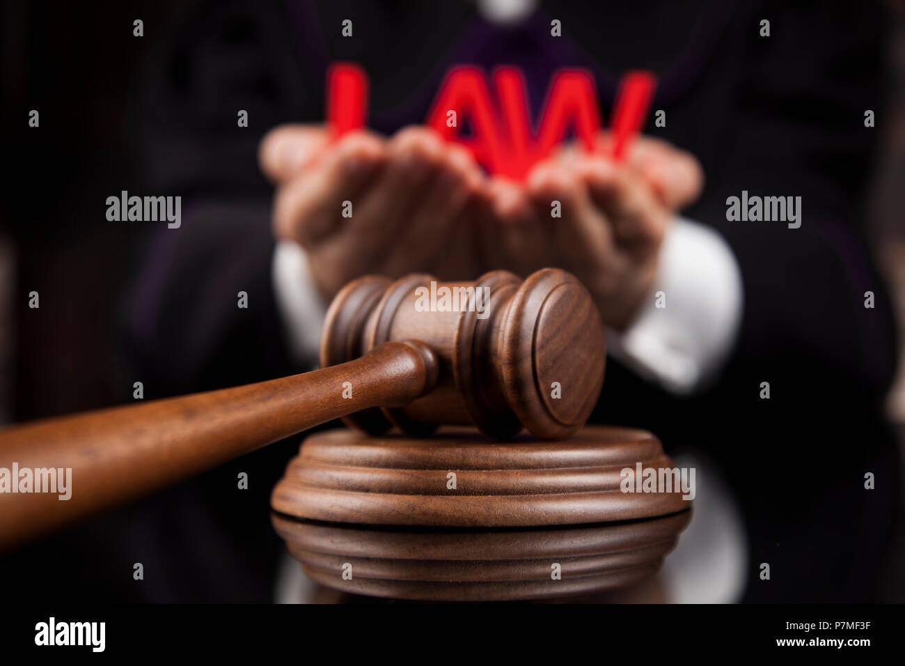 Judge, male judge in a courtroom striking the gavel Stock Photo - Alamy