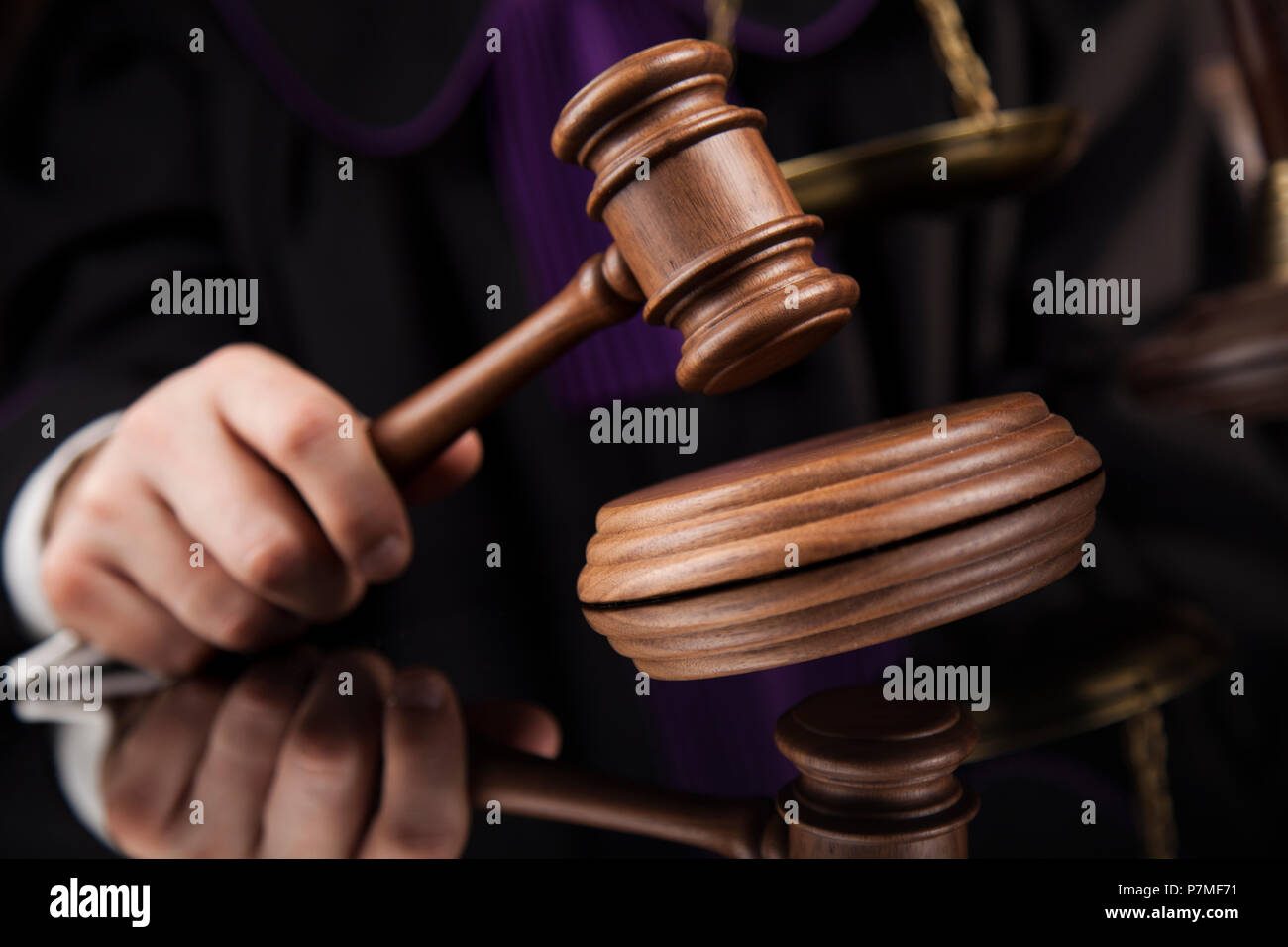 Judge, male judge in a courtroom striking the gavel Stock Photo - Alamy