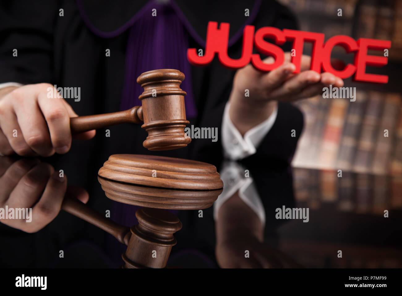 Judge, male judge in a courtroom striking the gavel Stock Photo - Alamy