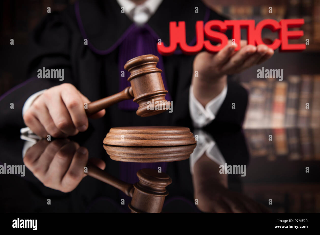 Judge, male judge in a courtroom striking the gavel Stock Photo - Alamy