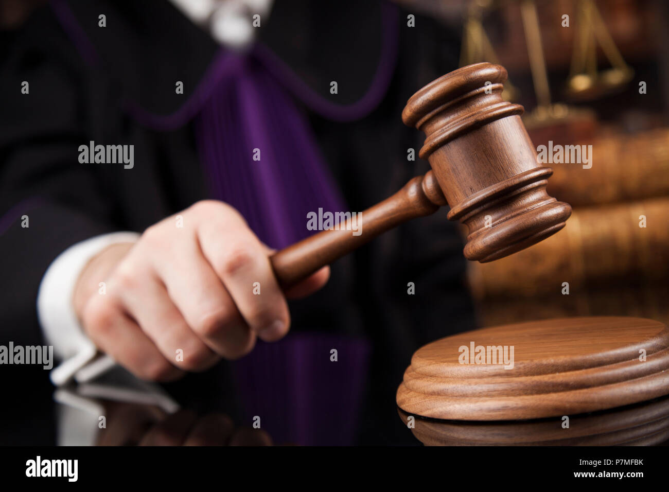 Judge, male judge in a courtroom striking the gavel Stock Photo - Alamy