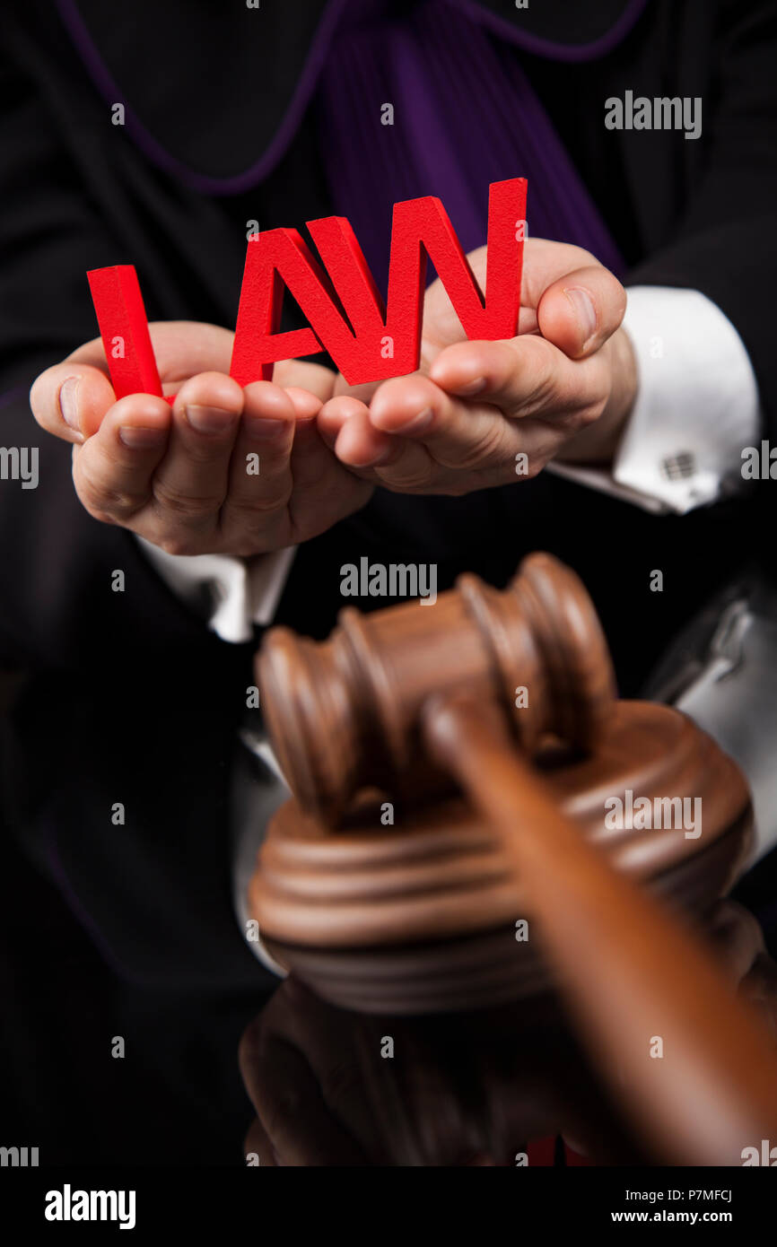 Judge, male judge in a courtroom striking the gavel Stock Photo - Alamy