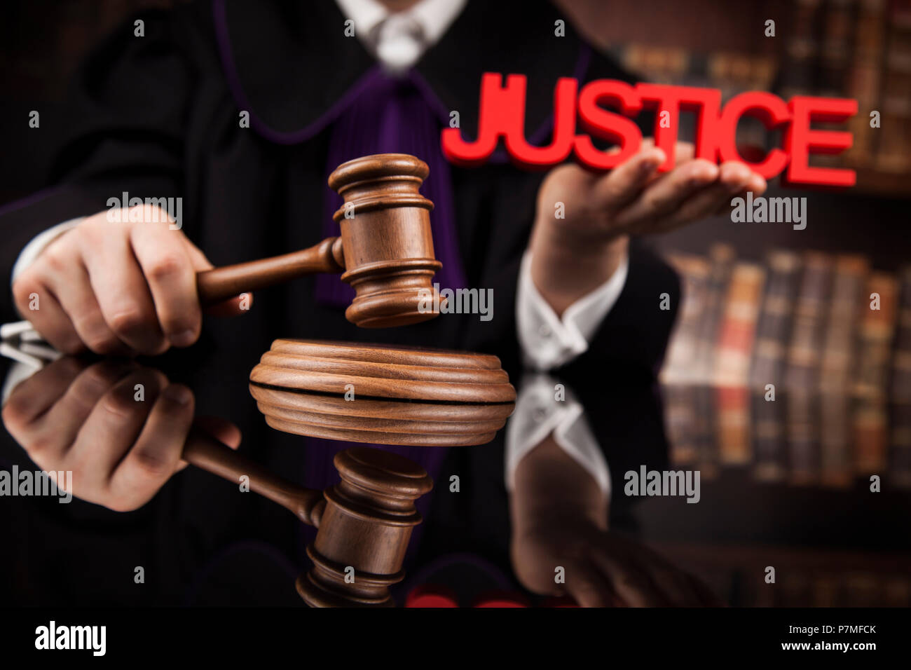 Judge, male judge in a courtroom striking the gavel Stock Photo - Alamy