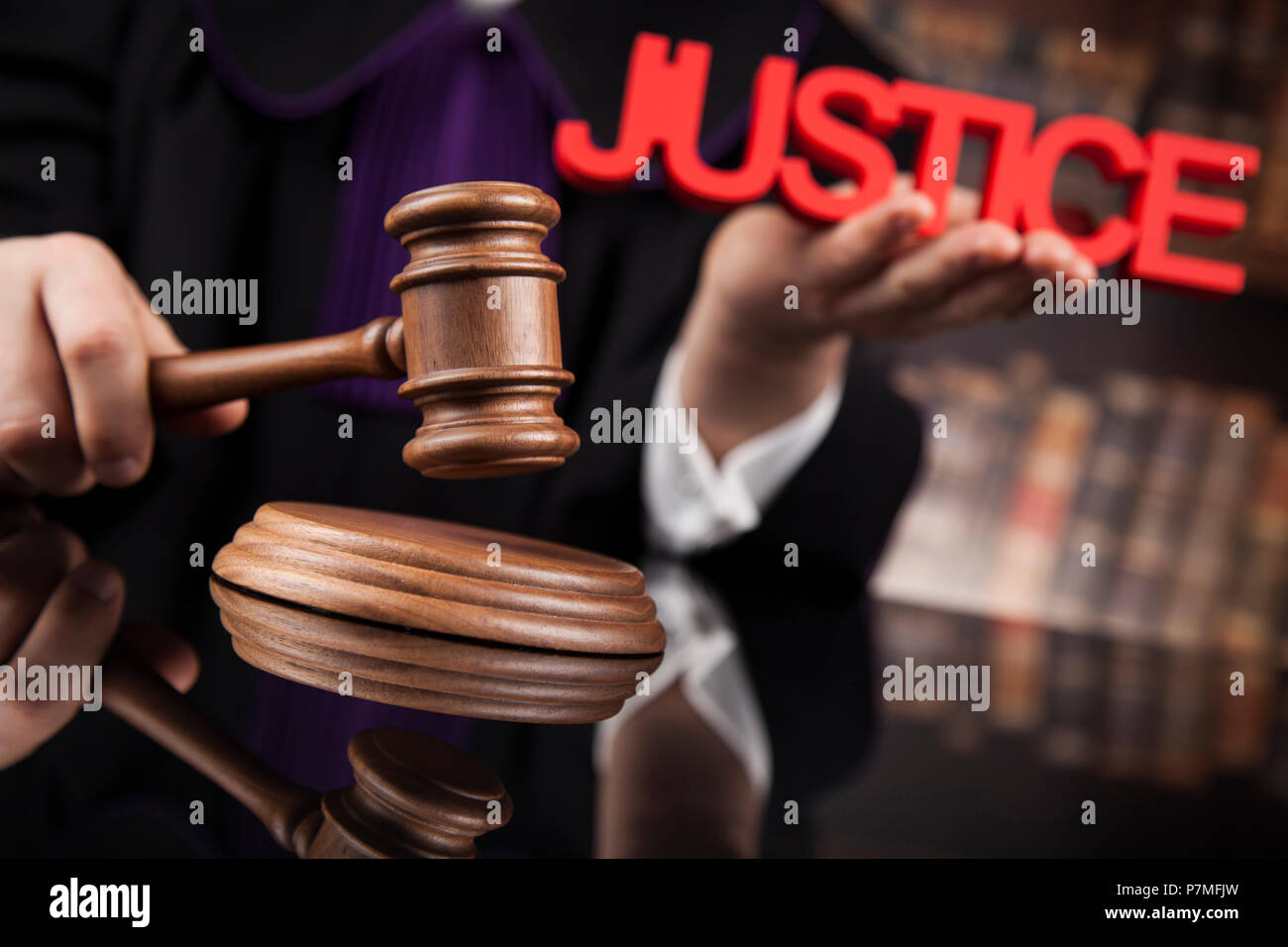 Judge, male judge in a courtroom striking the gavel Stock Photo - Alamy