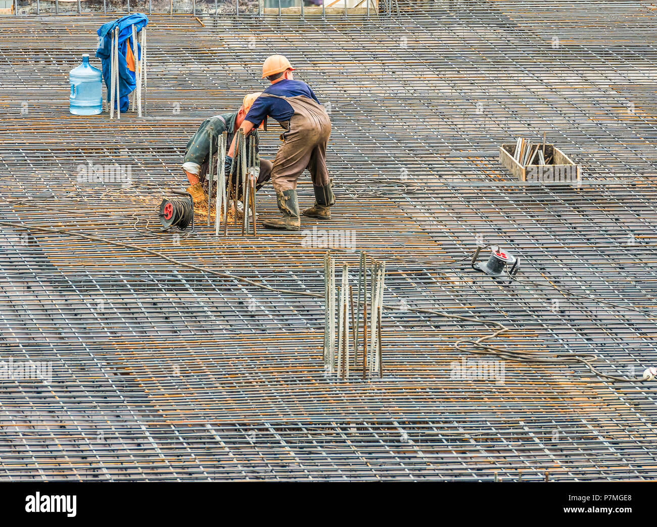 The employee works on the construction site. Performed work electric ...