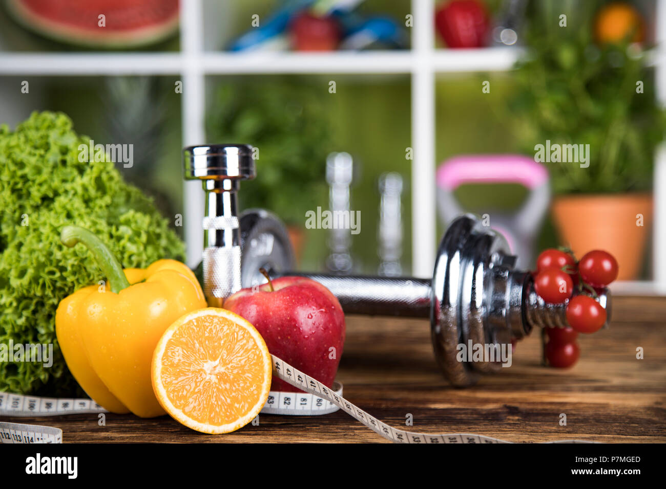 Vitamin and Fitness diet, dumbbell Stock Photo - Alamy