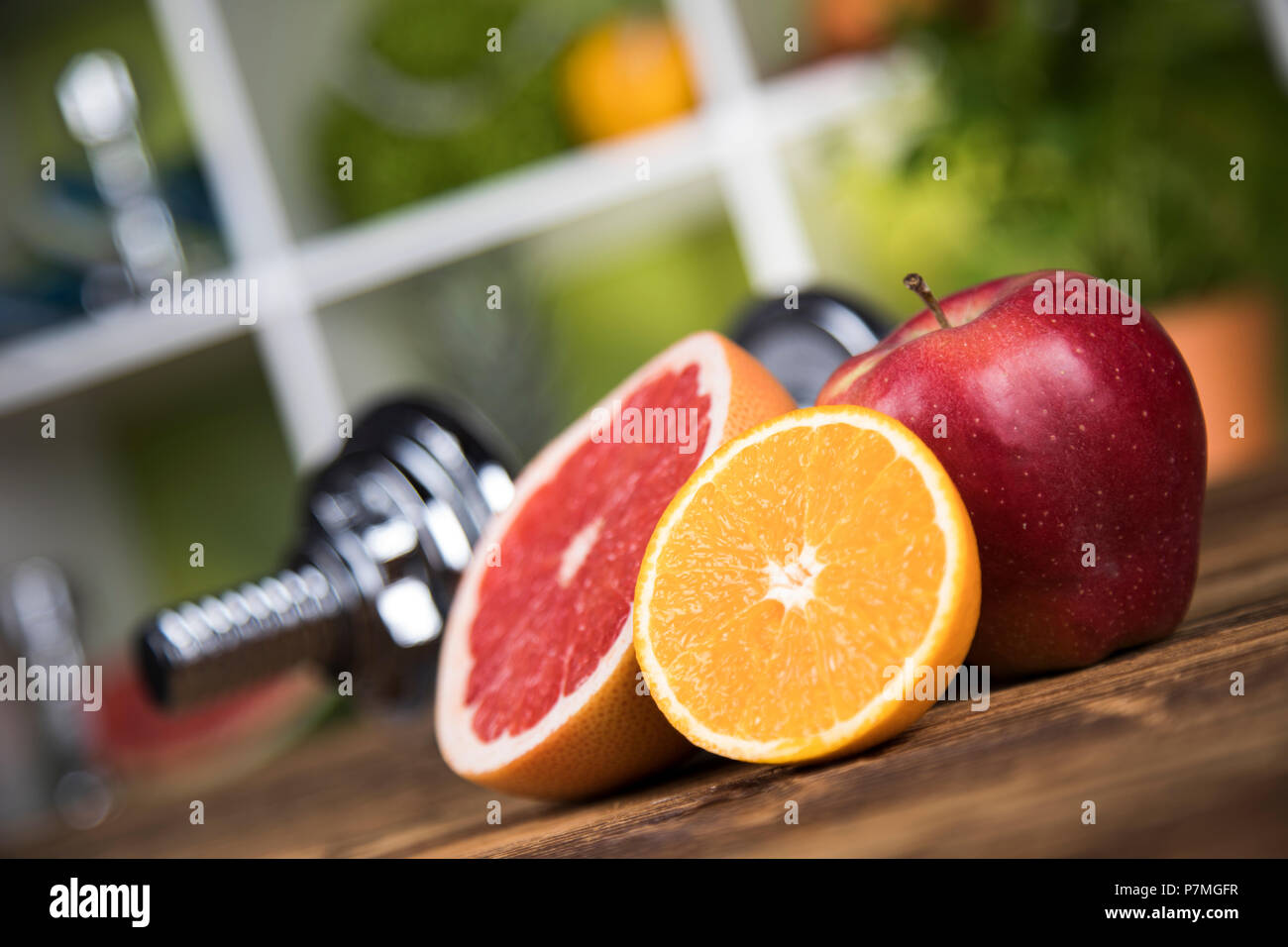 Vitamin and Fitness diet, dumbbell Stock Photo - Alamy