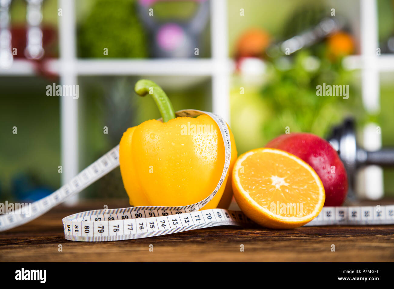 Vitamin and Fitness diet, dumbbell Stock Photo - Alamy