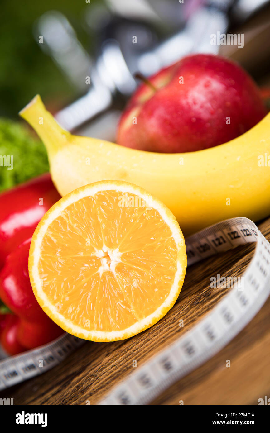 Vitamin and Fitness diet, dumbbell Stock Photo - Alamy