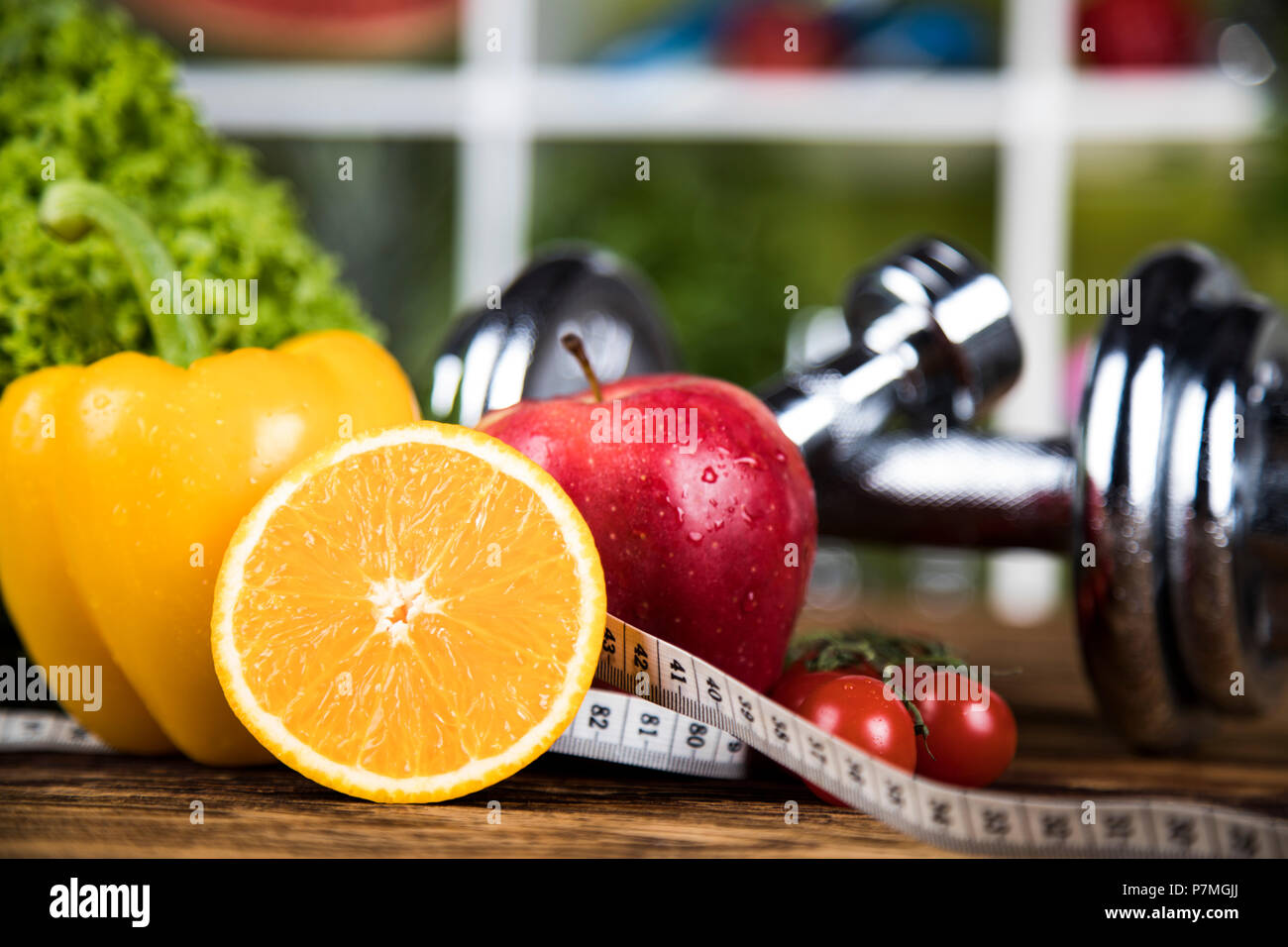 Vitamin and Fitness diet, dumbbell Stock Photo - Alamy