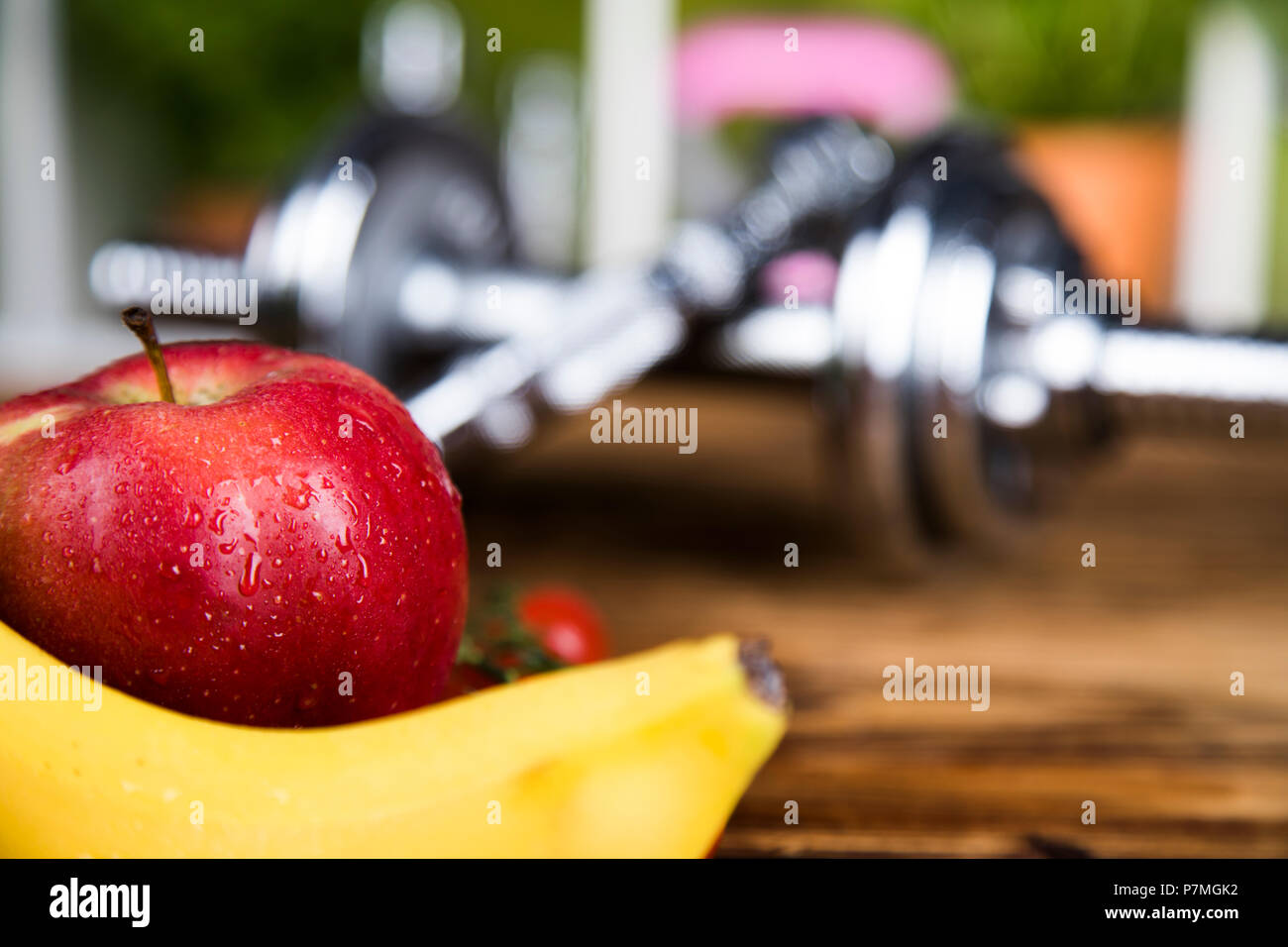 Vitamin and Fitness diet, dumbbell Stock Photo - Alamy