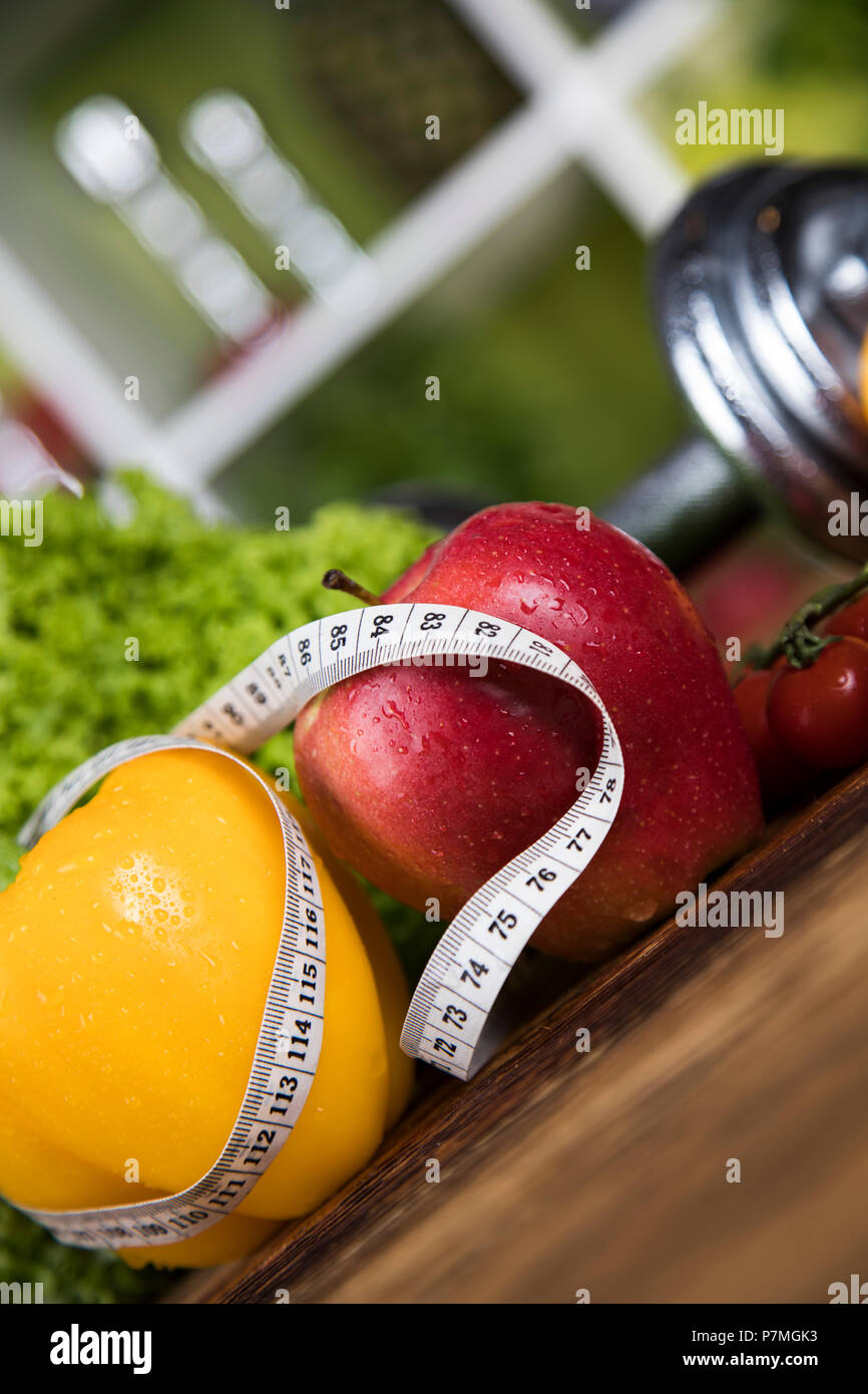 Vitamin and Fitness diet, dumbbell Stock Photo - Alamy