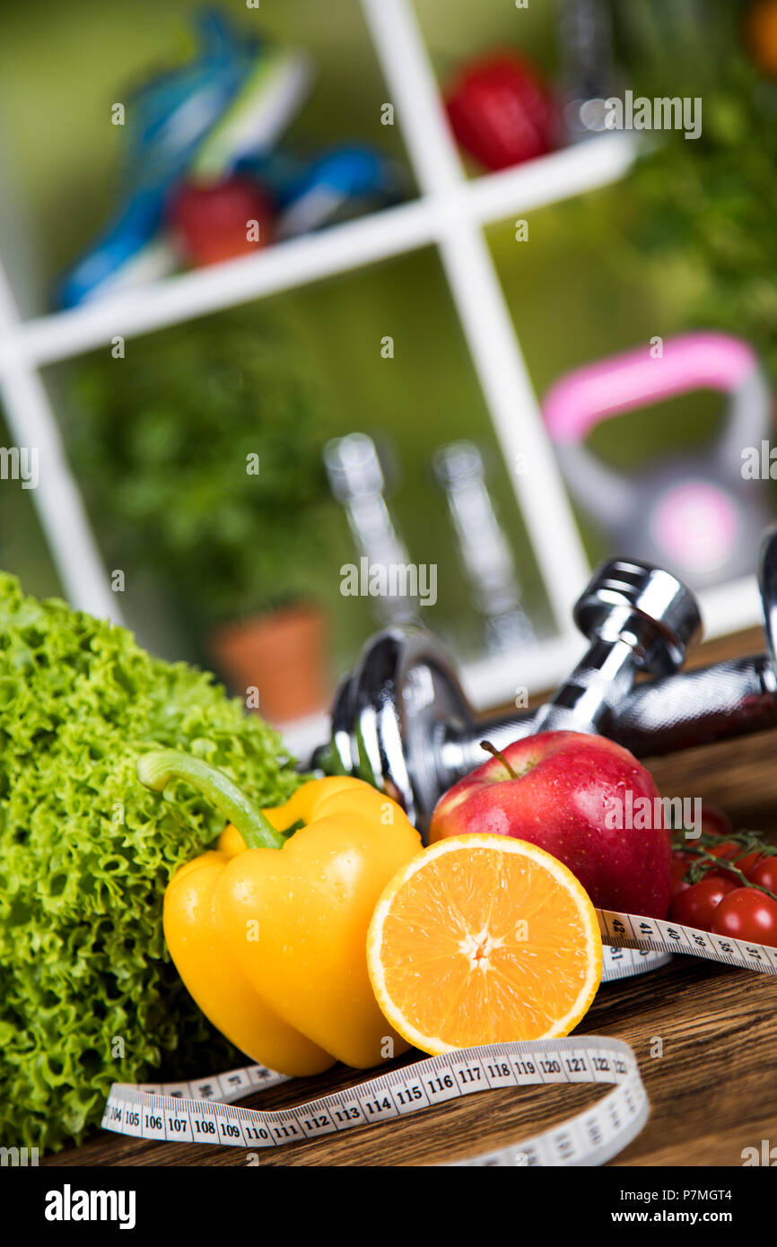 Vitamin and Fitness diet, dumbbell Stock Photo - Alamy