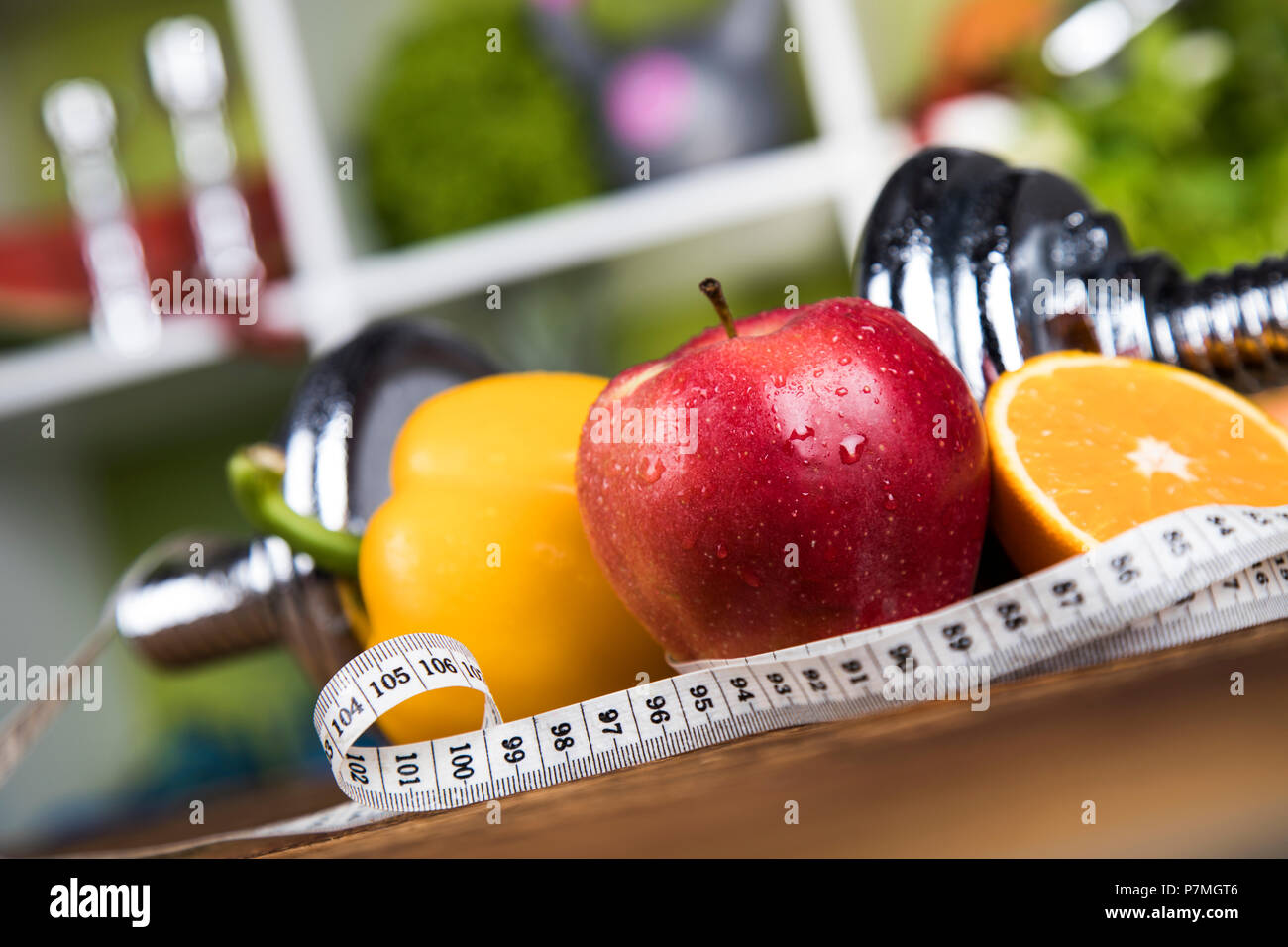 Vitamin and Fitness diet, dumbbell Stock Photo - Alamy