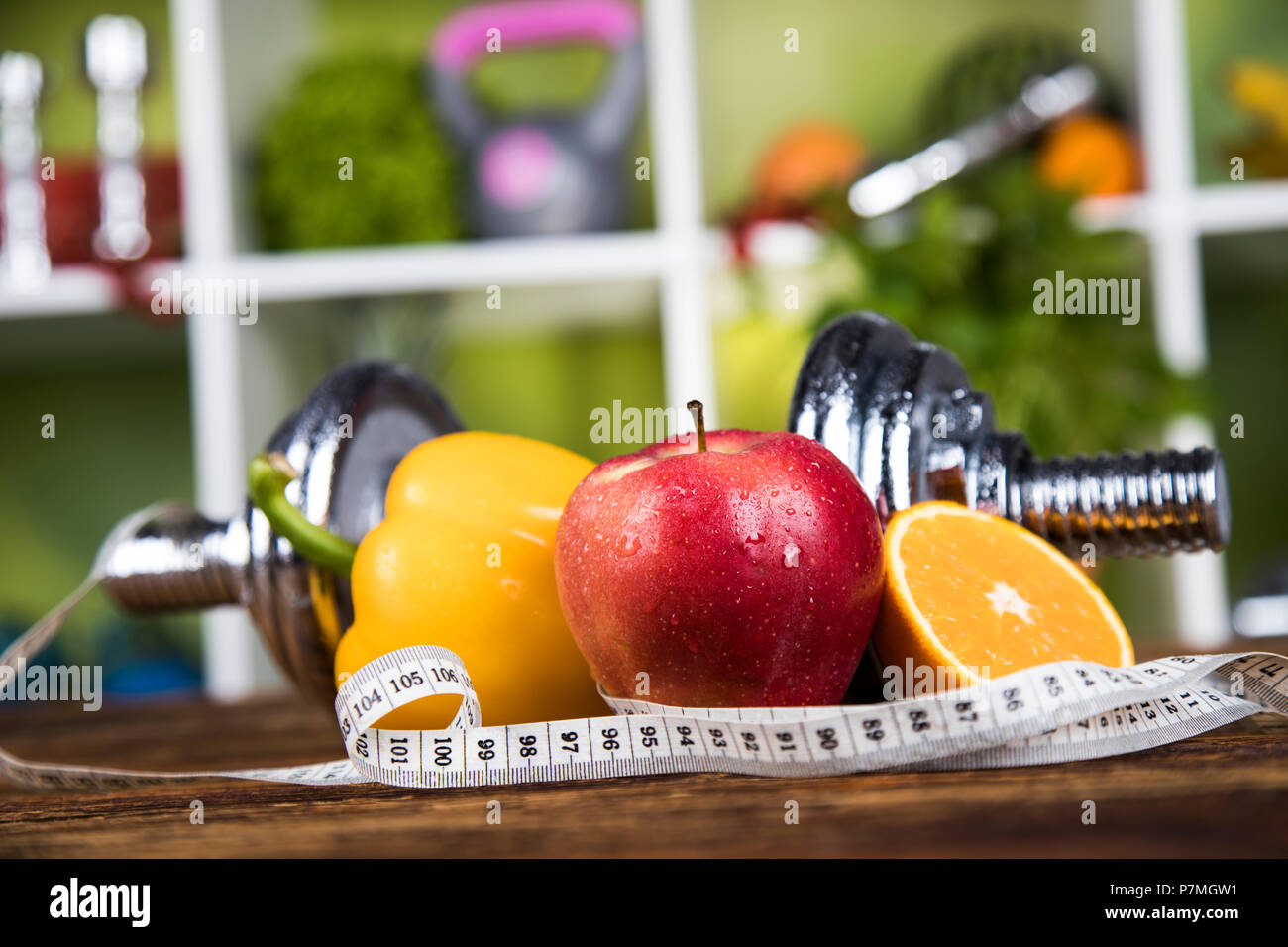 Vitamin and Fitness diet, dumbbell Stock Photo - Alamy