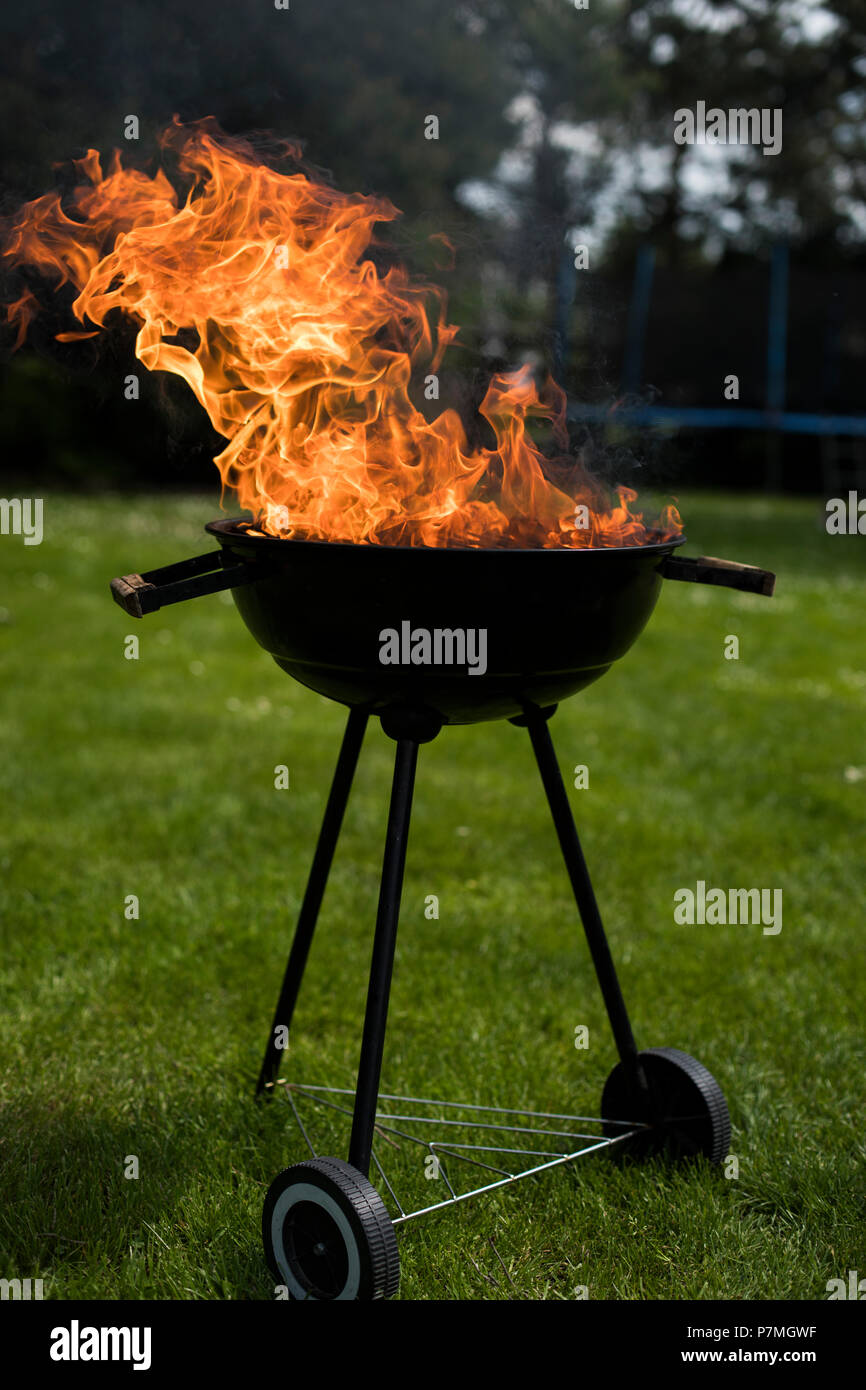 Grill on the garden, barbecue and fire background Stock Photo - Alamy
