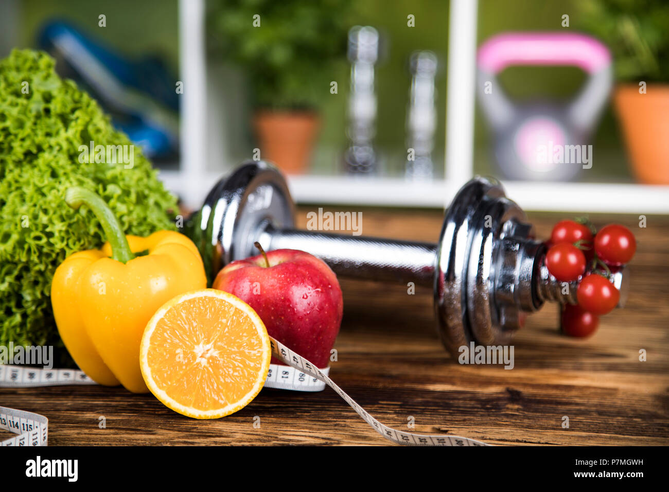 Vitamin and Fitness diet, dumbbell Stock Photo - Alamy