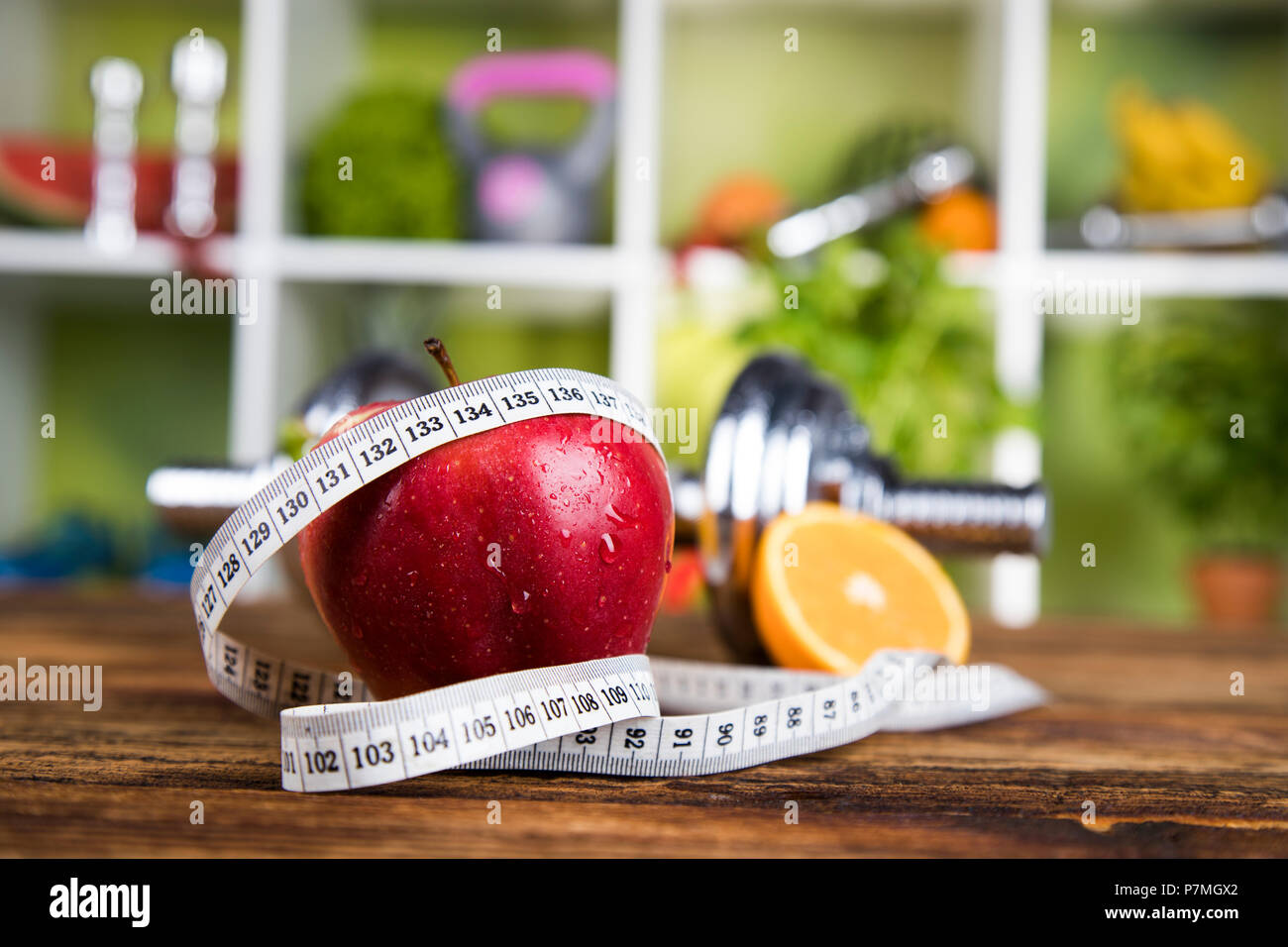 Vitamin and Fitness diet, dumbbell Stock Photo - Alamy