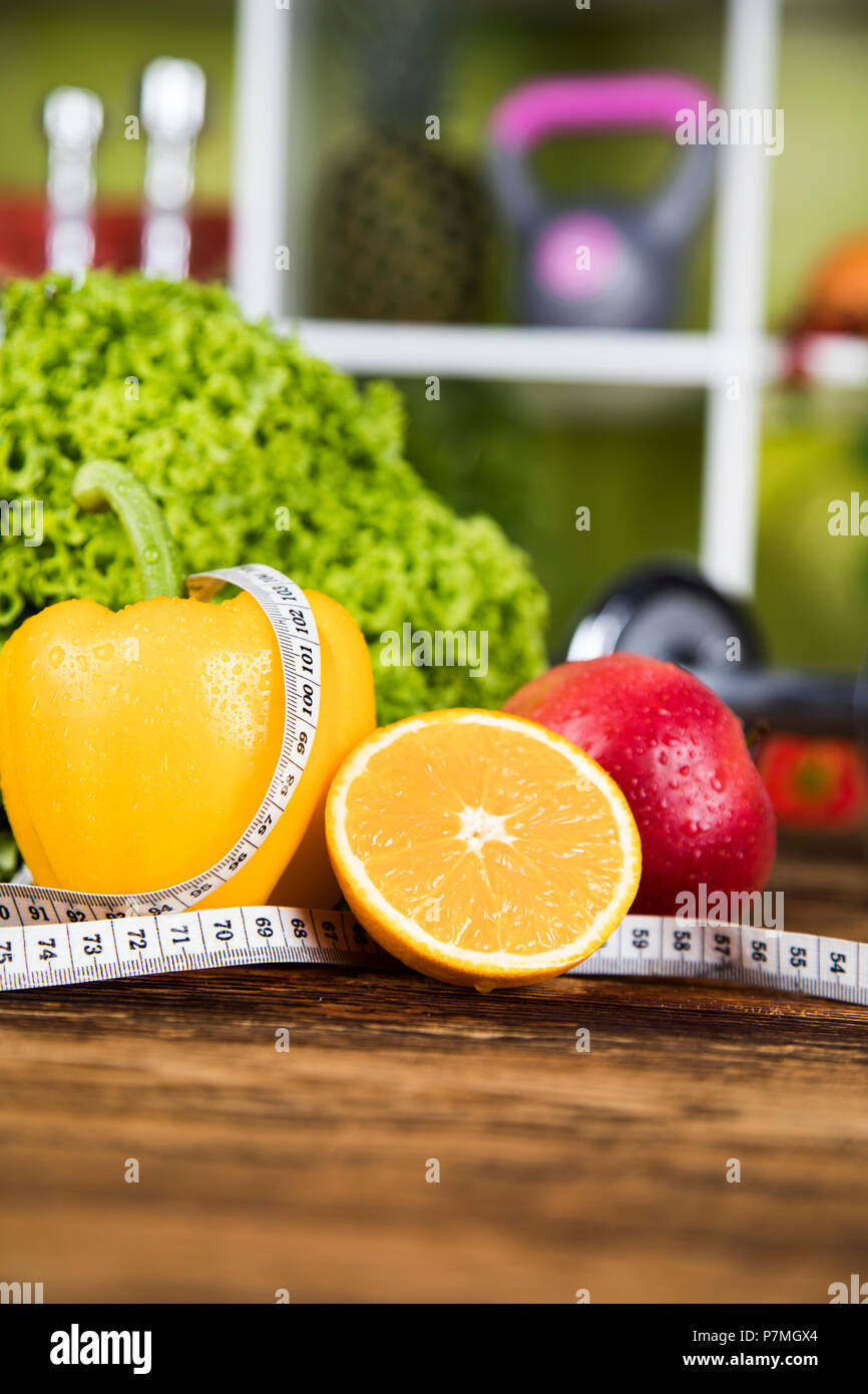 Vitamin and Fitness diet, dumbbell Stock Photo - Alamy