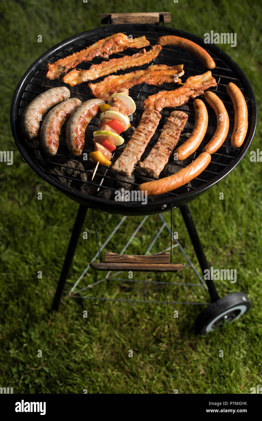 Assorted grilled meat on a summer barbecue, BBQ concept Stock Photo - Alamy
