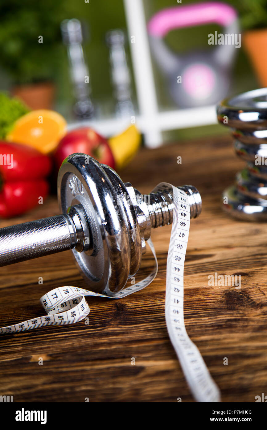 Vitamin and Fitness diet, dumbbell Stock Photo - Alamy