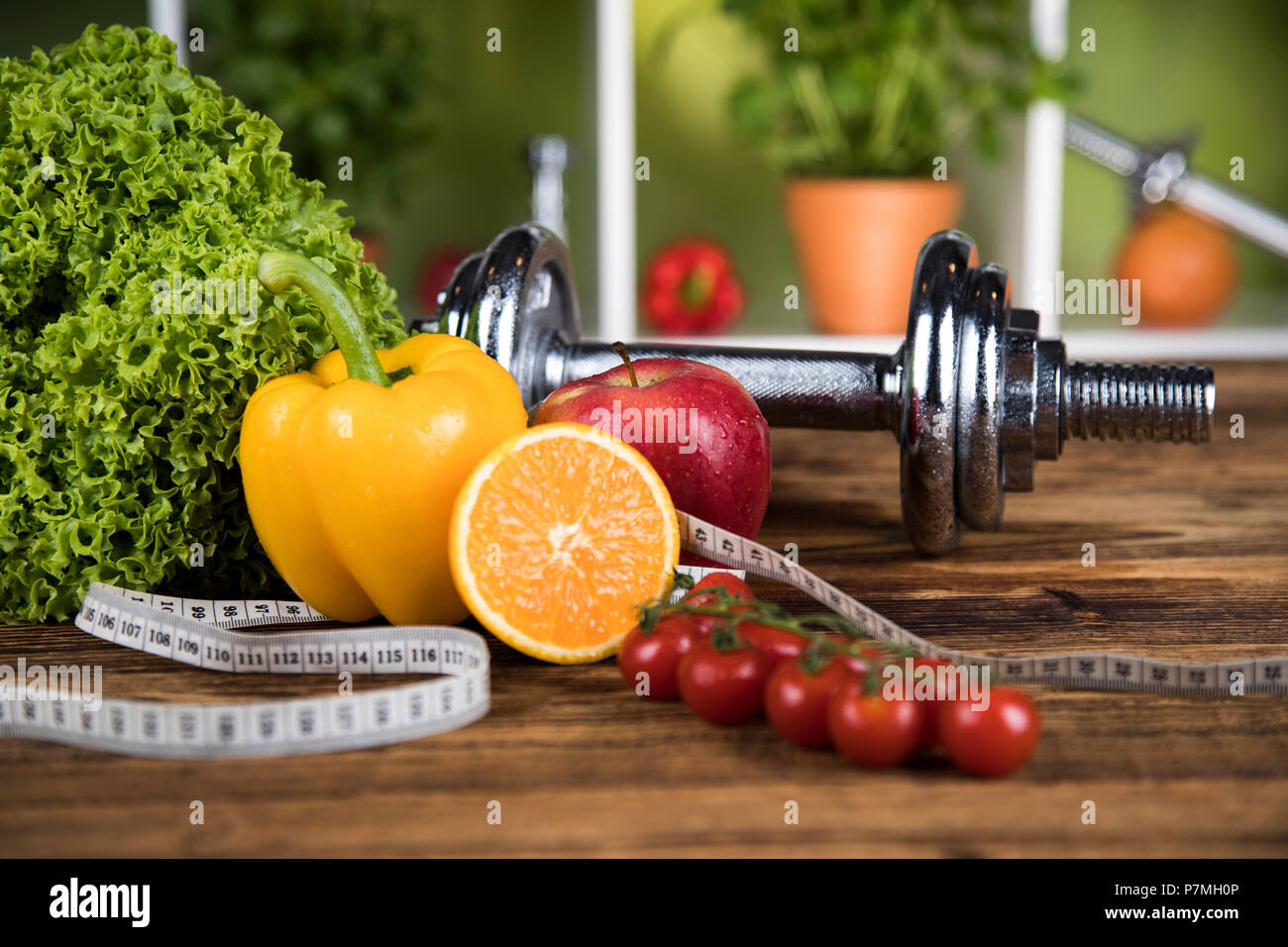 Vitamin and Fitness diet, dumbbell Stock Photo - Alamy