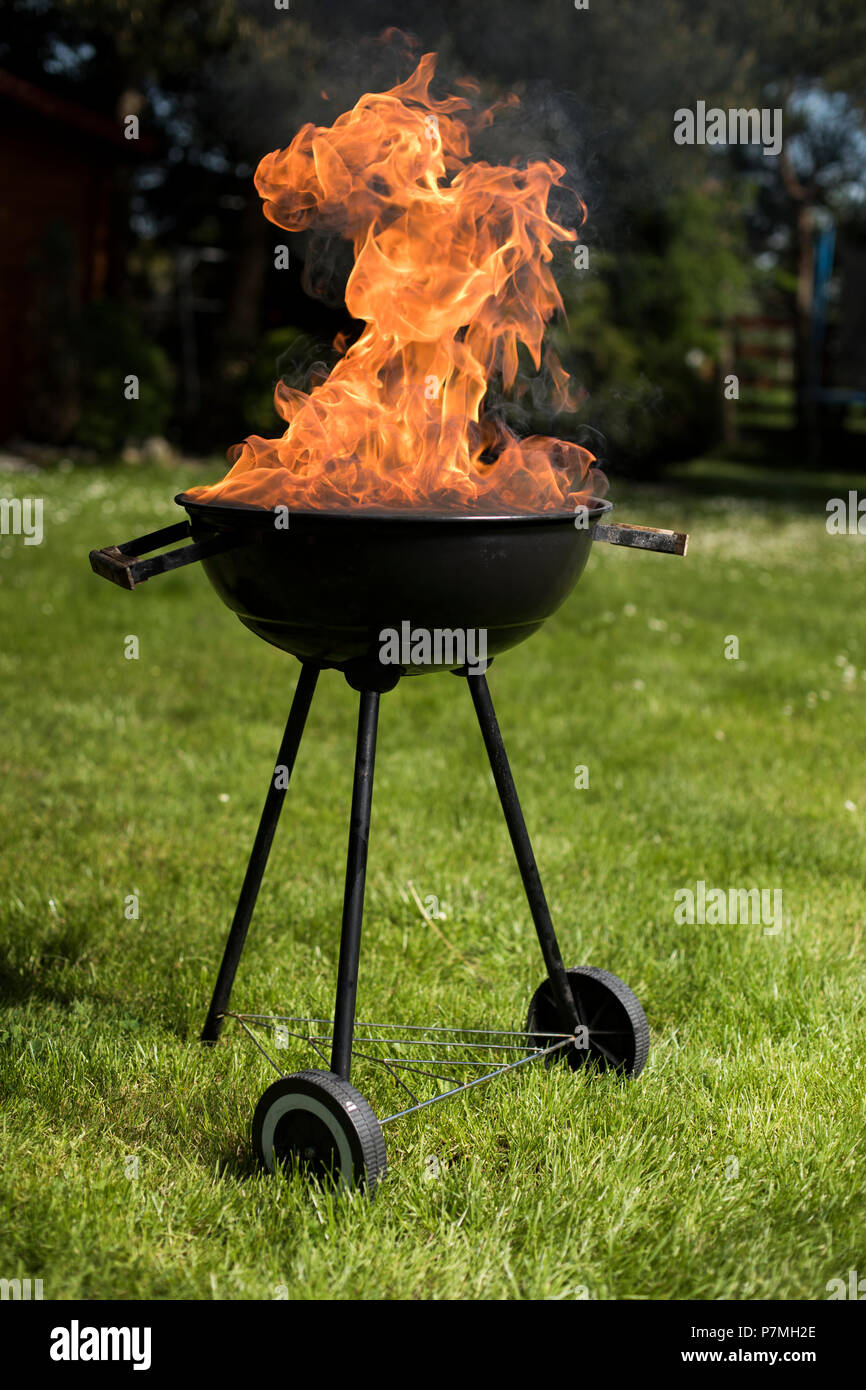 Grill on the garden, barbecue and fire background Stock Photo - Alamy