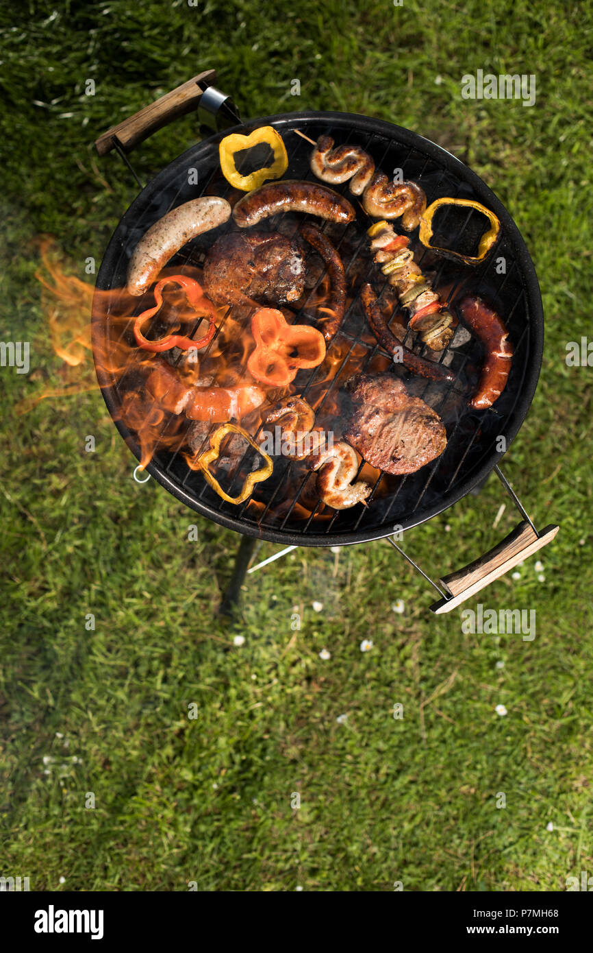 Assorted grilled meat on a summer barbecue, BBQ concept Stock Photo - Alamy