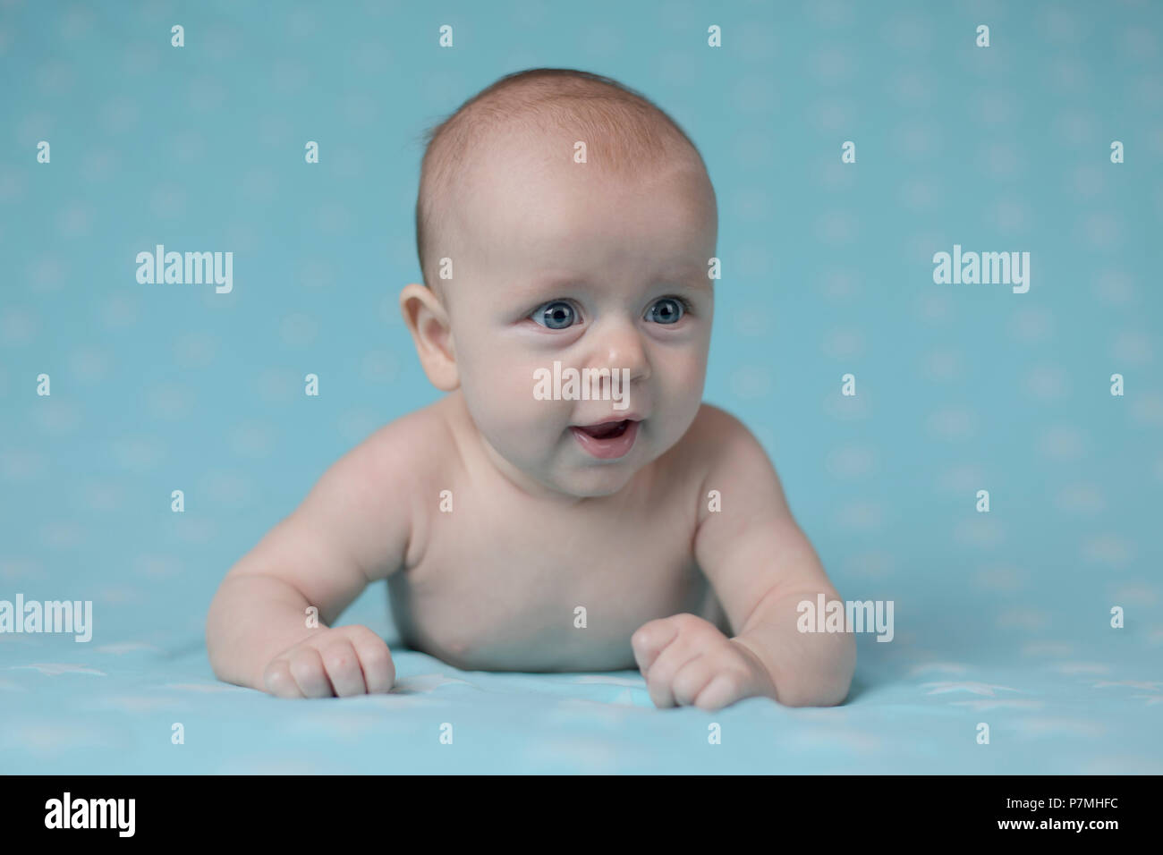 Crawling baby boy Stock Photo - Alamy