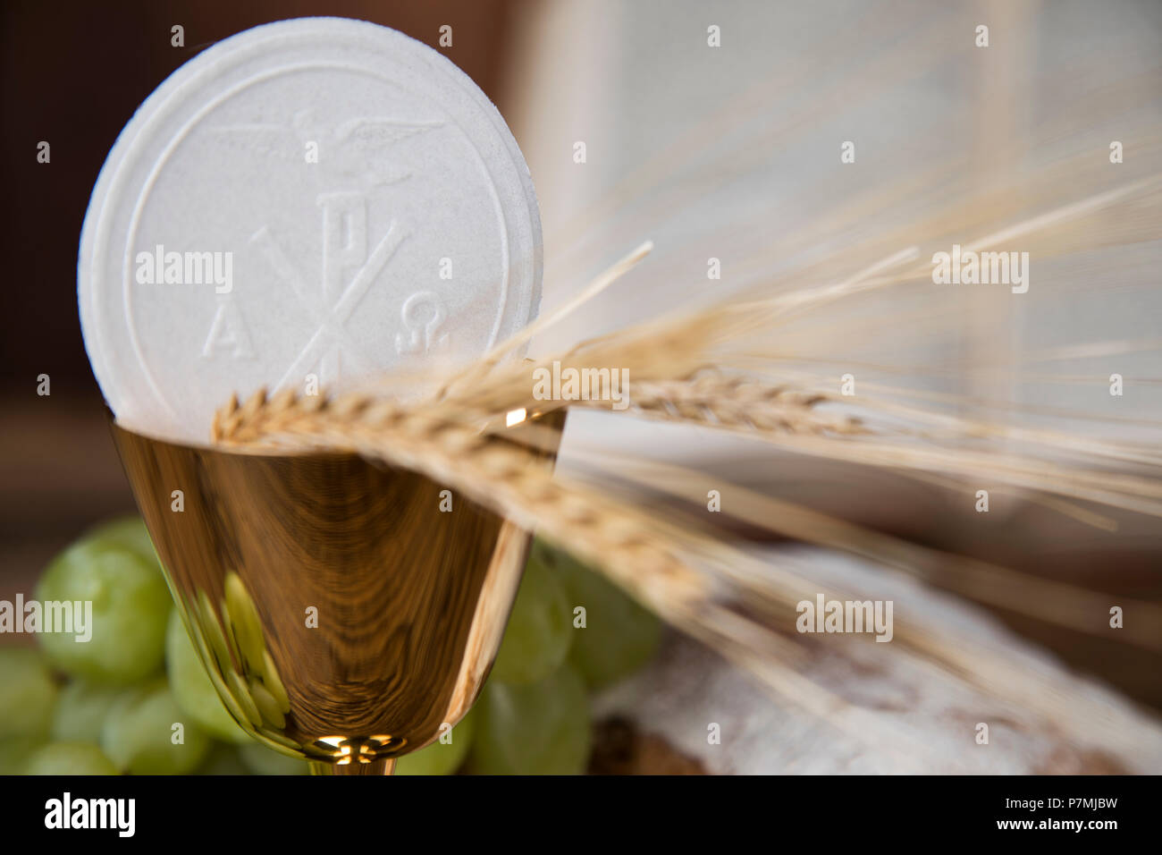 Eucharist symbol of bread and wine, chalice and host, First communion ...