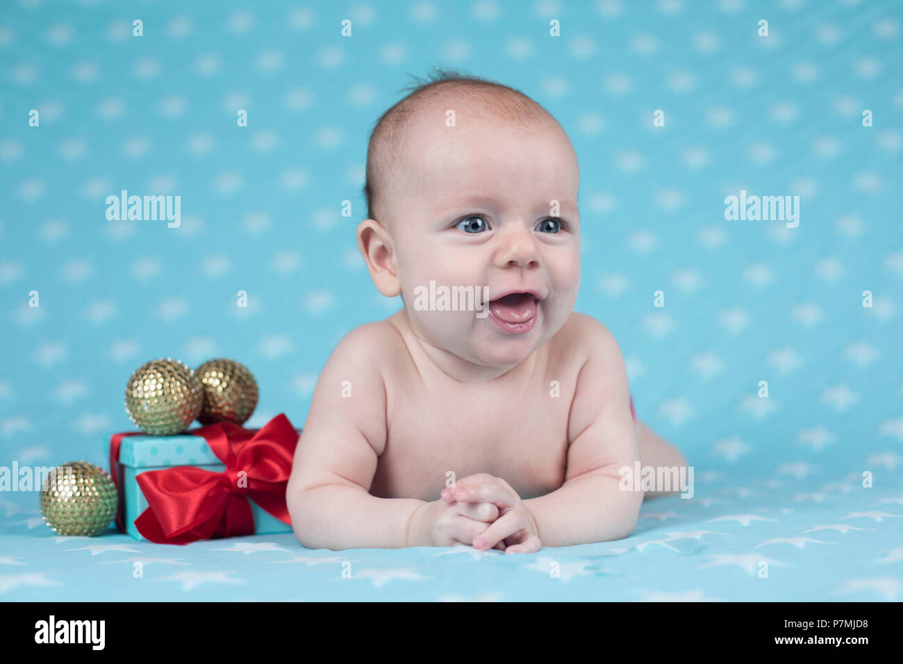 Little cute baby crawling Stock Photo - Alamy
